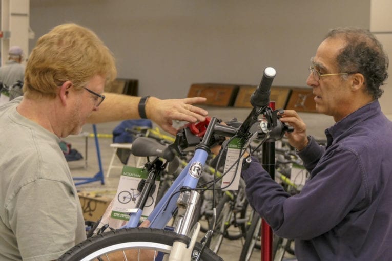 After theft, hundreds show up for annual bike build event ...