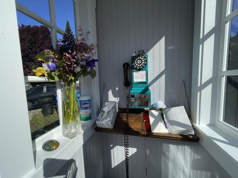 Washington’s first wind phone booth opens following candlelight vigil ...